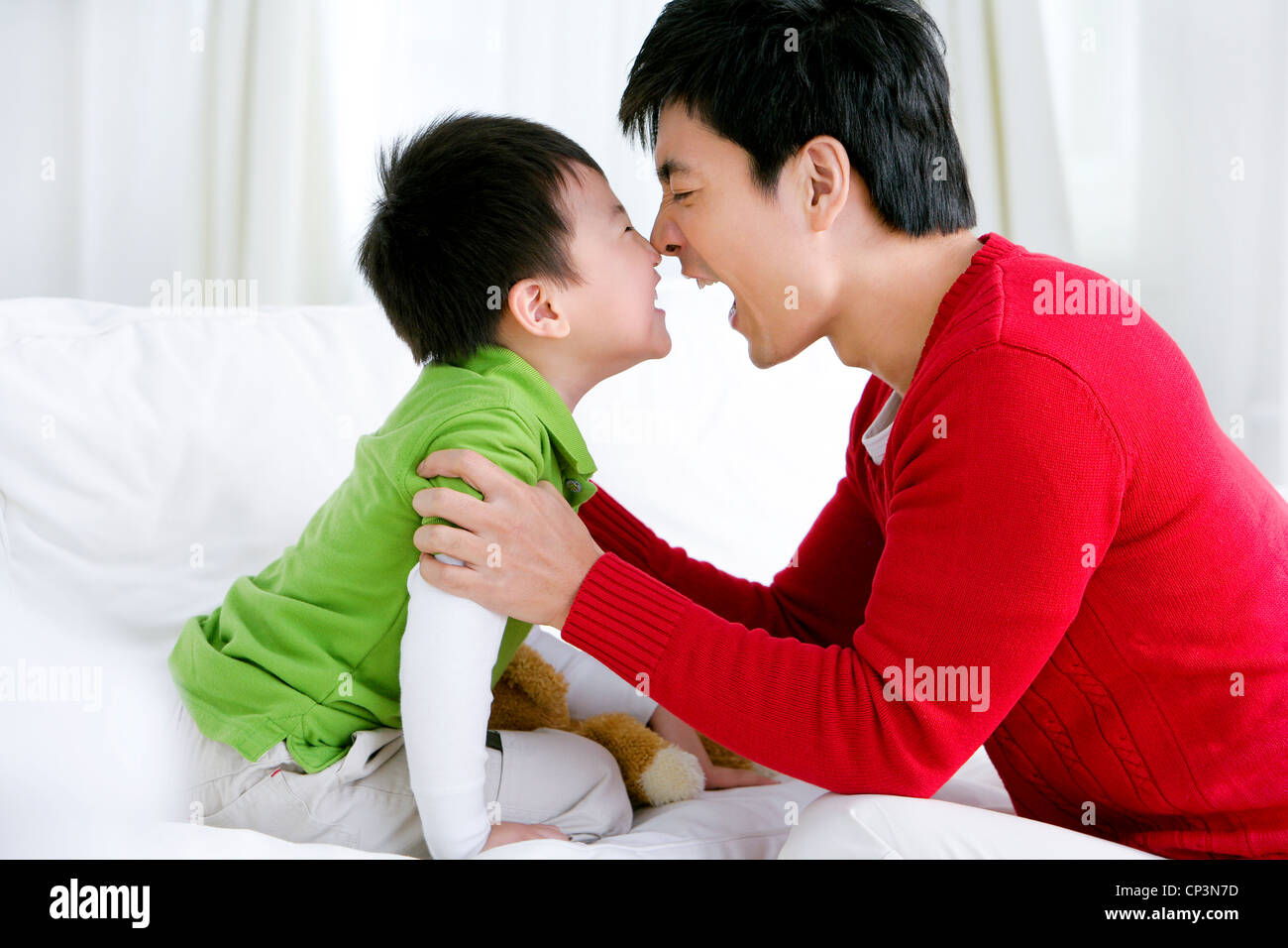 Happy Chinese father with son Stock Photo - Alamy