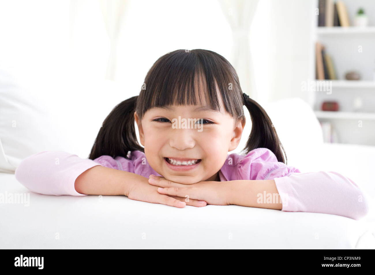 Chinese girl daydreaming Stock Photo - Alamy