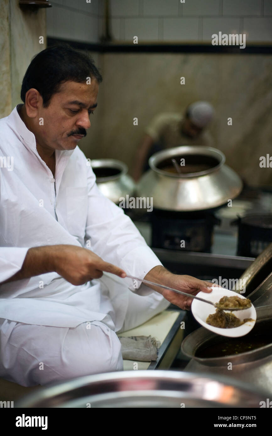 Mr Moin Uddin the chairman of Karim's serving food. Karim's Restaurant ...