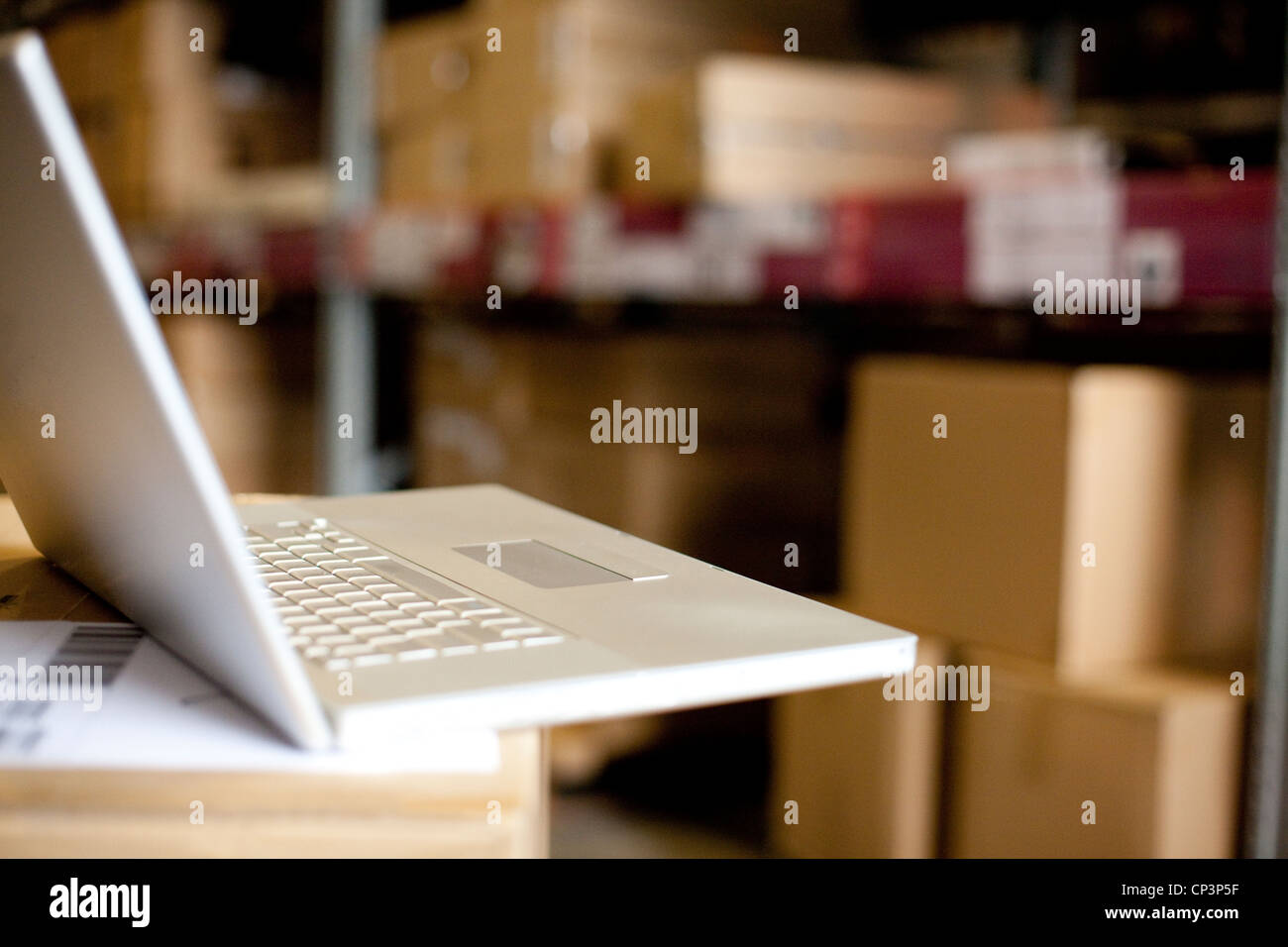 Laptop in a warehouse Stock Photo - Alamy