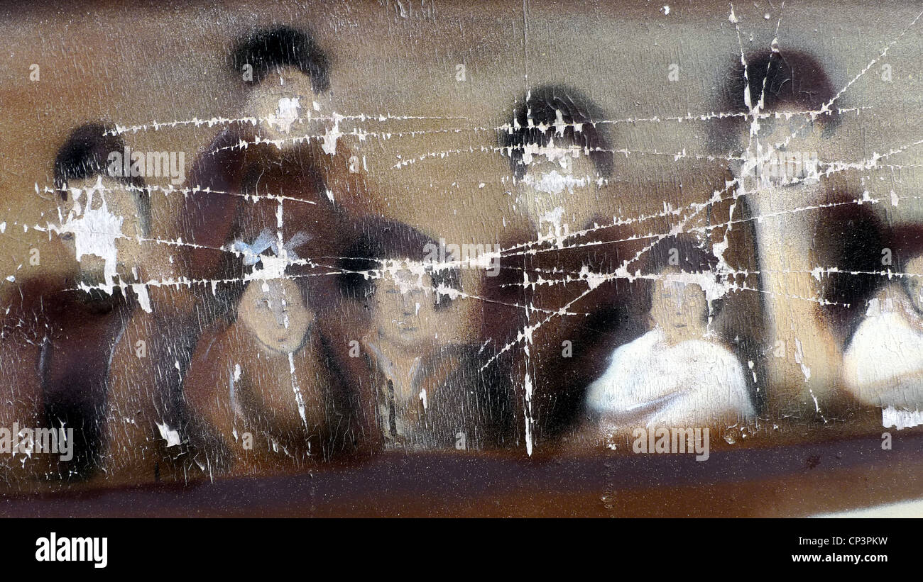 painted image of faces subsequently scratched & defaced Stock Photo - Alamy
