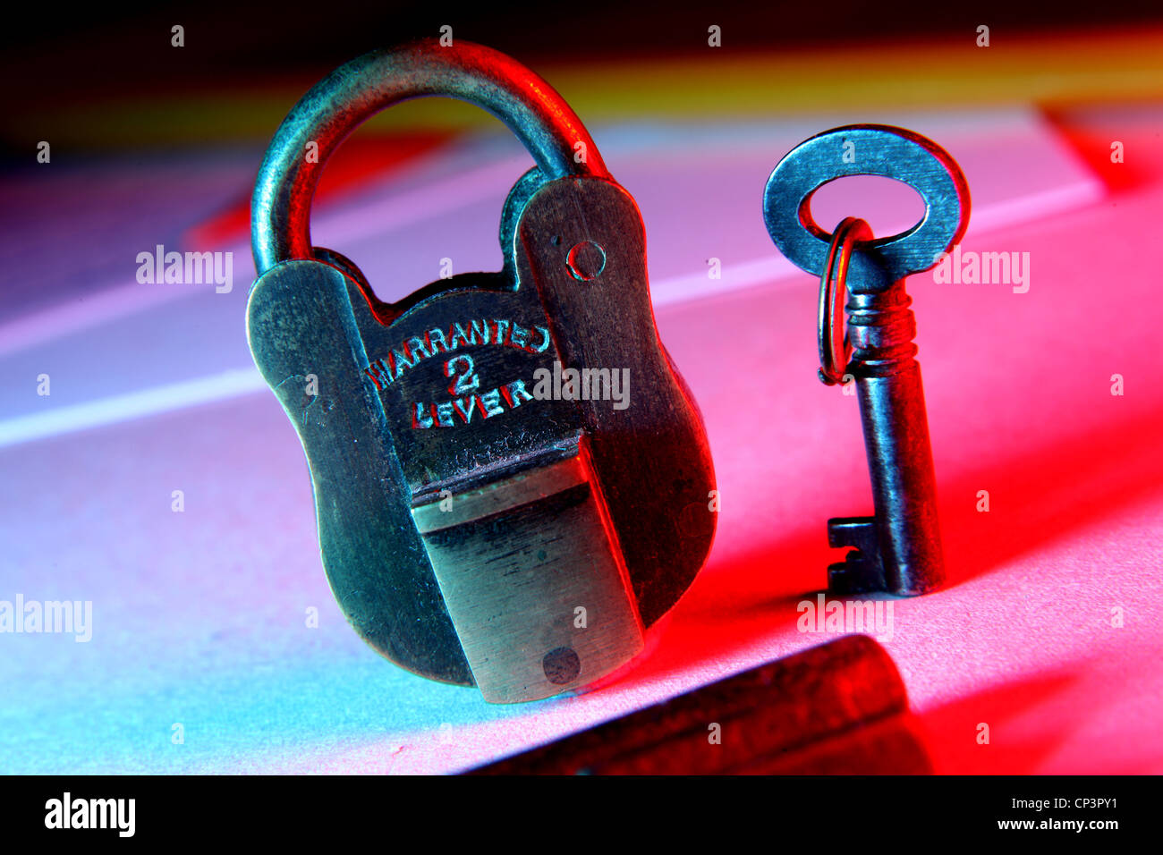 Security . Classic padlock and key with contemporary lighting Stock ...