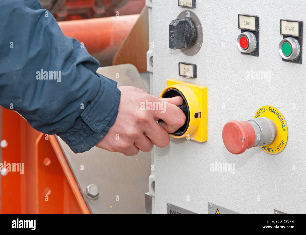 hands of man and button - industry plant Stock Photo - Alamy