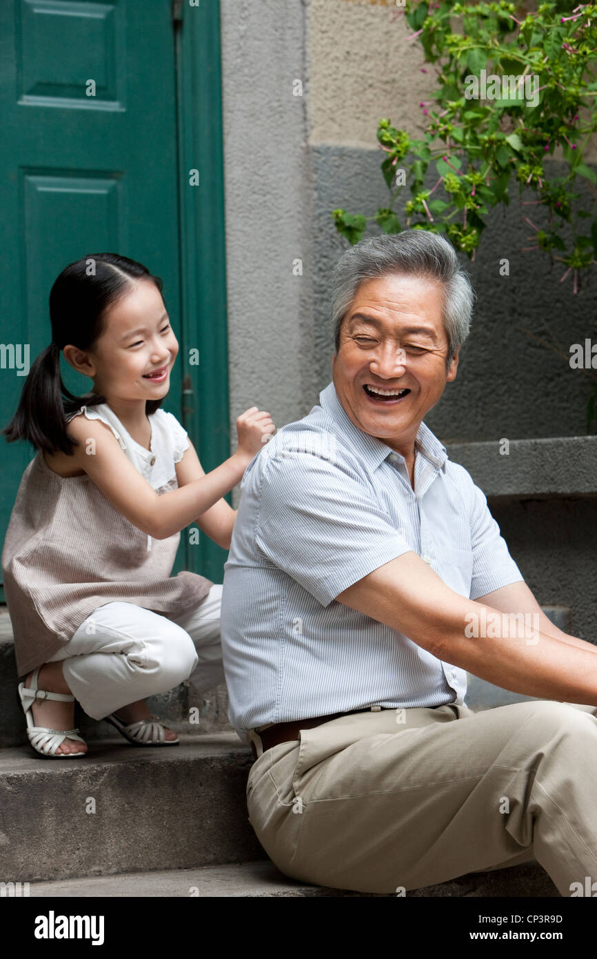 Child grandparent stoop hi-res stock photography and images - Alamy