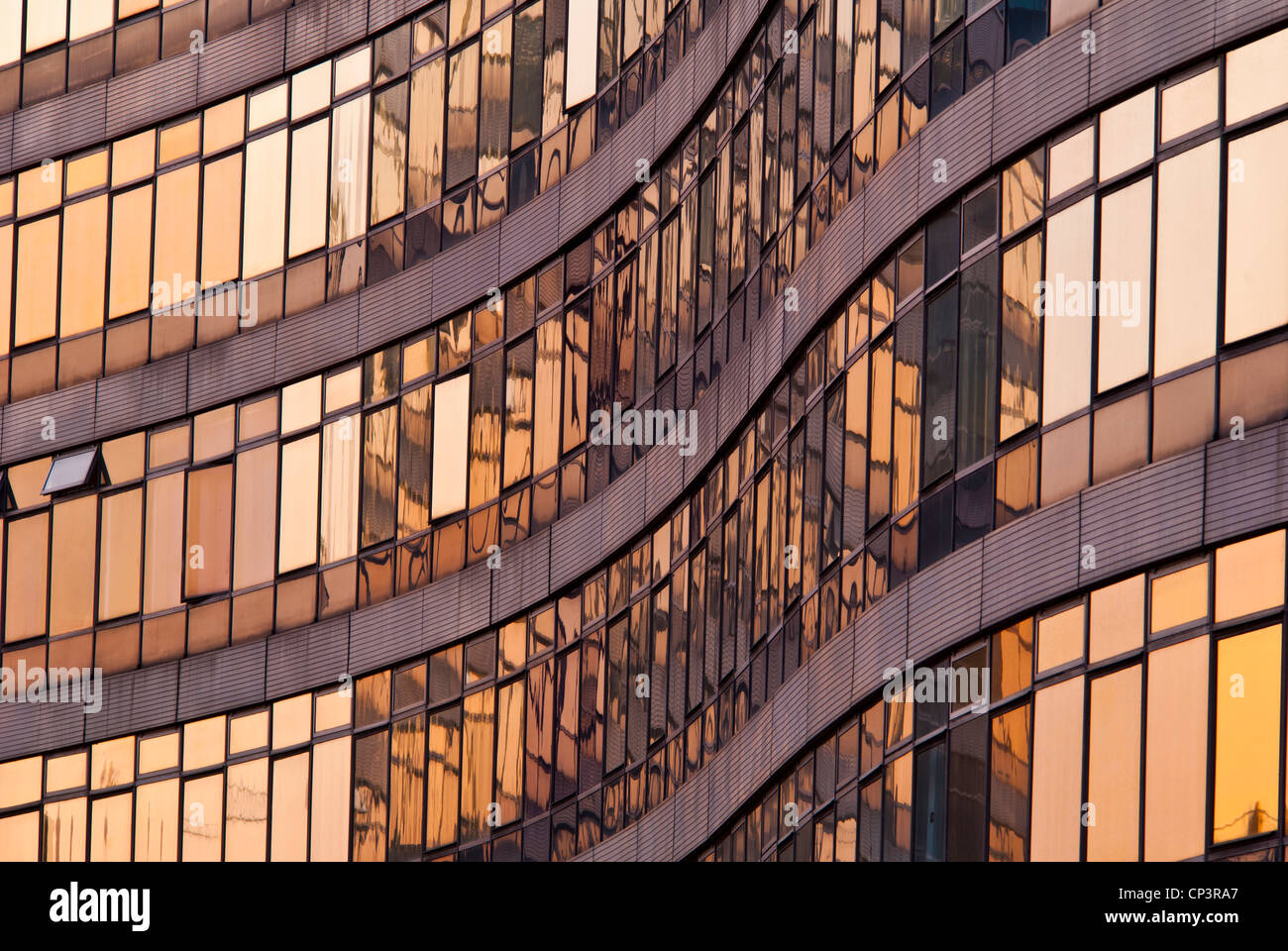 Curves of a building with mirror glass windows, Manchester, England, UK ...