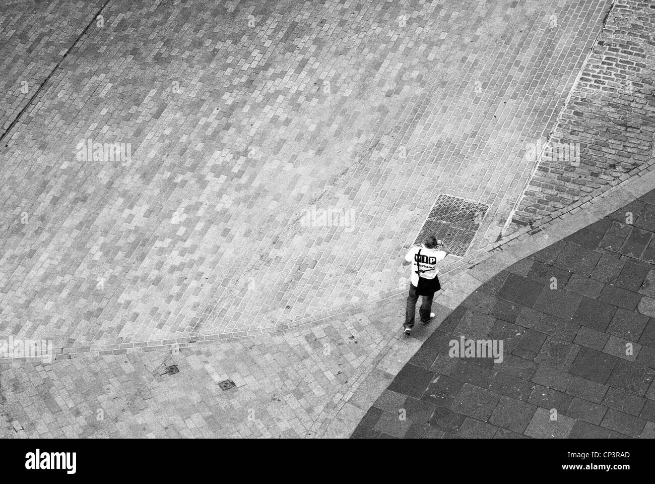 Overhead shot of man walking Stock Photo - Alamy