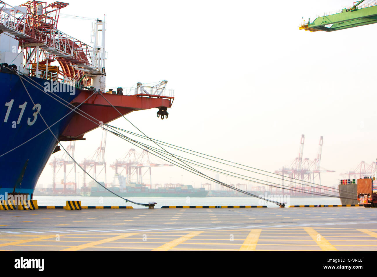 Cargo ship in shipping port Stock Photo - Alamy