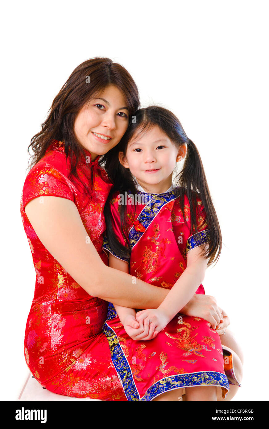 Traditional Chinese Asian mother and her daughter on white background ...
