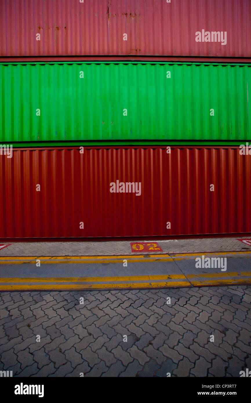 Red and green cargo containers Stock Photo - Alamy