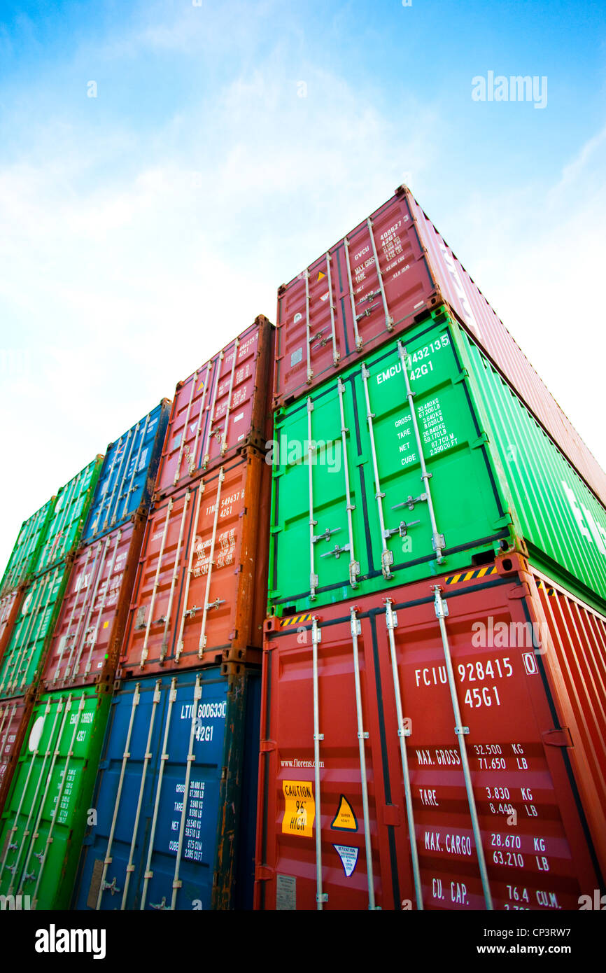 Multi-colored stack of cargo containers Stock Photo - Alamy