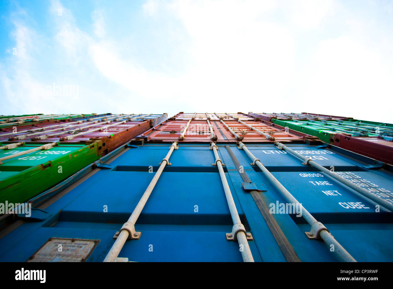 Multi-colored stack of cargo containers Stock Photo - Alamy