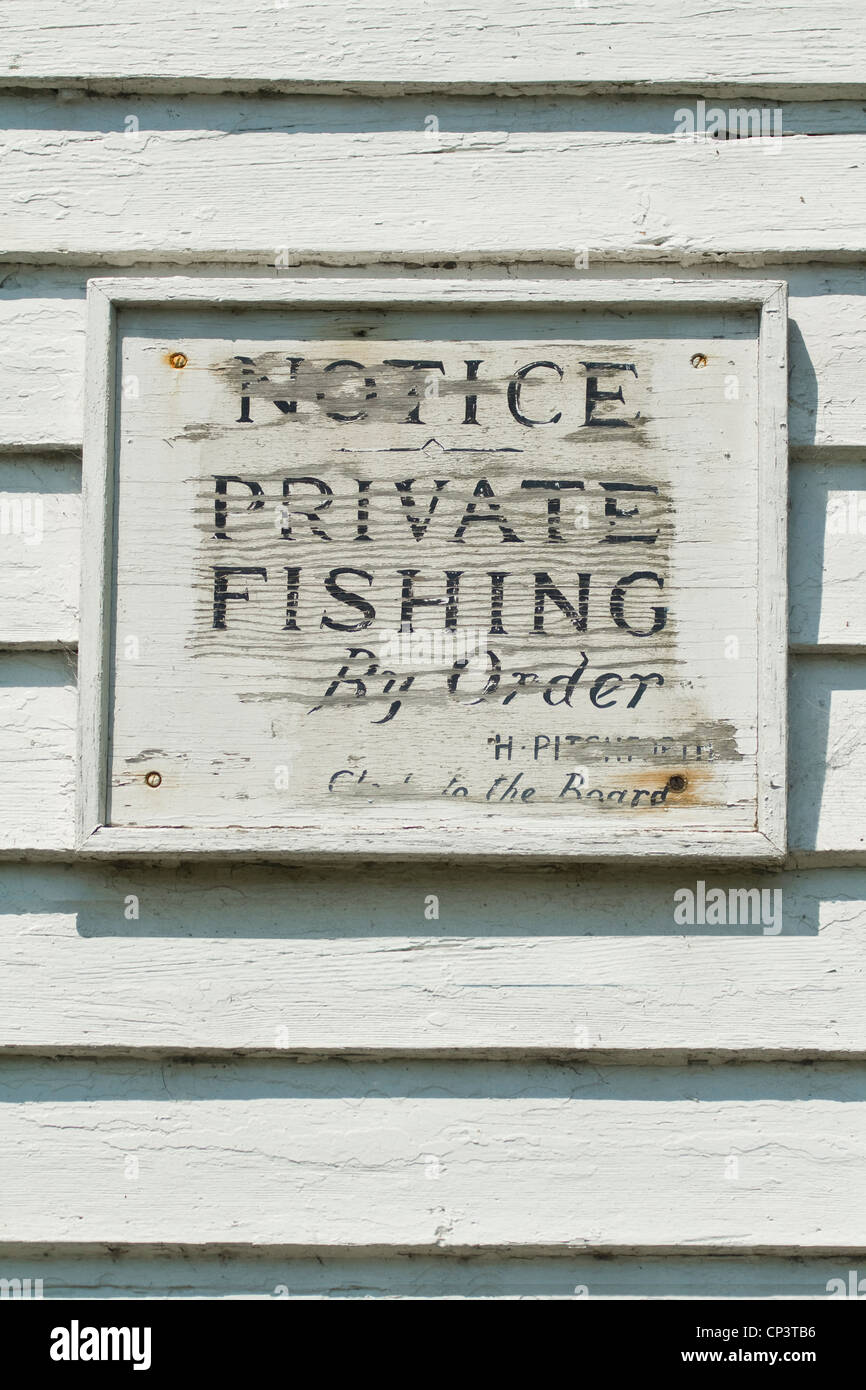 Weathered wooden private fishing sign Stock Photo - Alamy