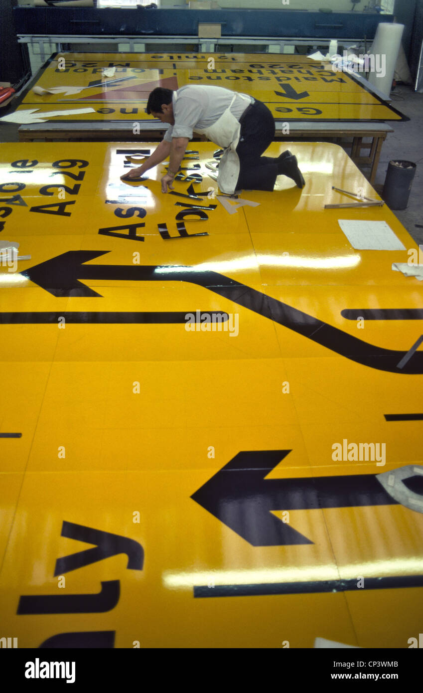 creating traffic signs in factory workshop Stock Photo - Alamy