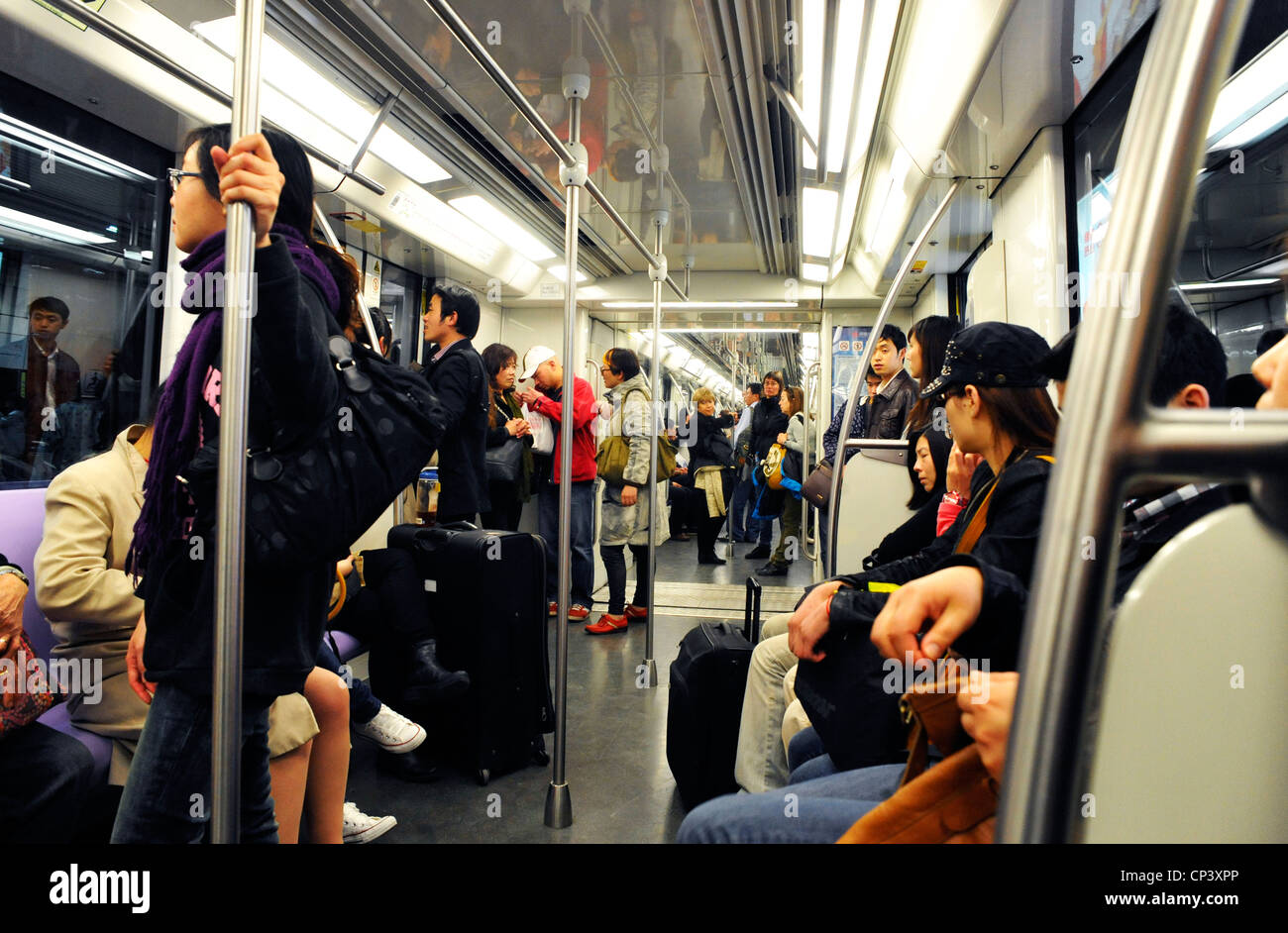 Passengers on the Shanghai Metro Stock Photo - Alamy