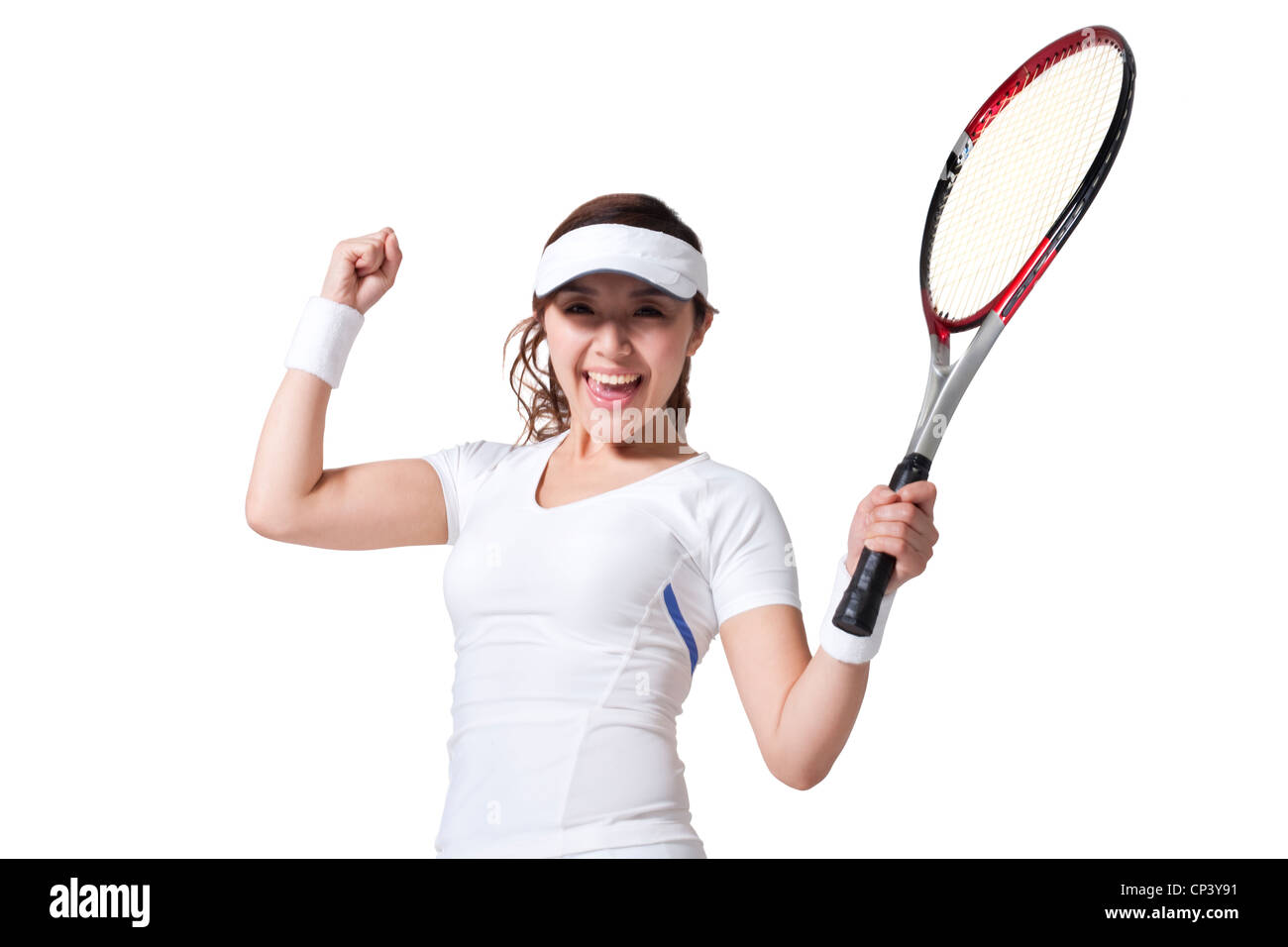Young woman playing tennis and cheering Stock Photo - Alamy