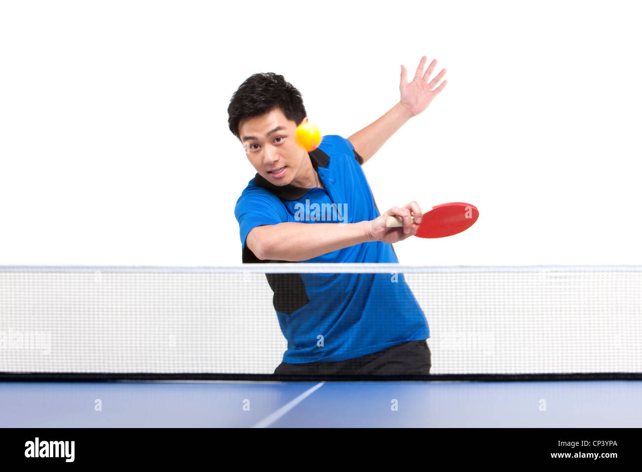 Table tennis player hitting ball hi-res stock photography and images ...