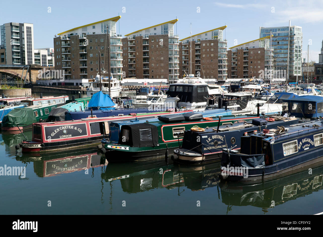 Motor launch narrow boats limehouse basin reflections hi-res stock ...