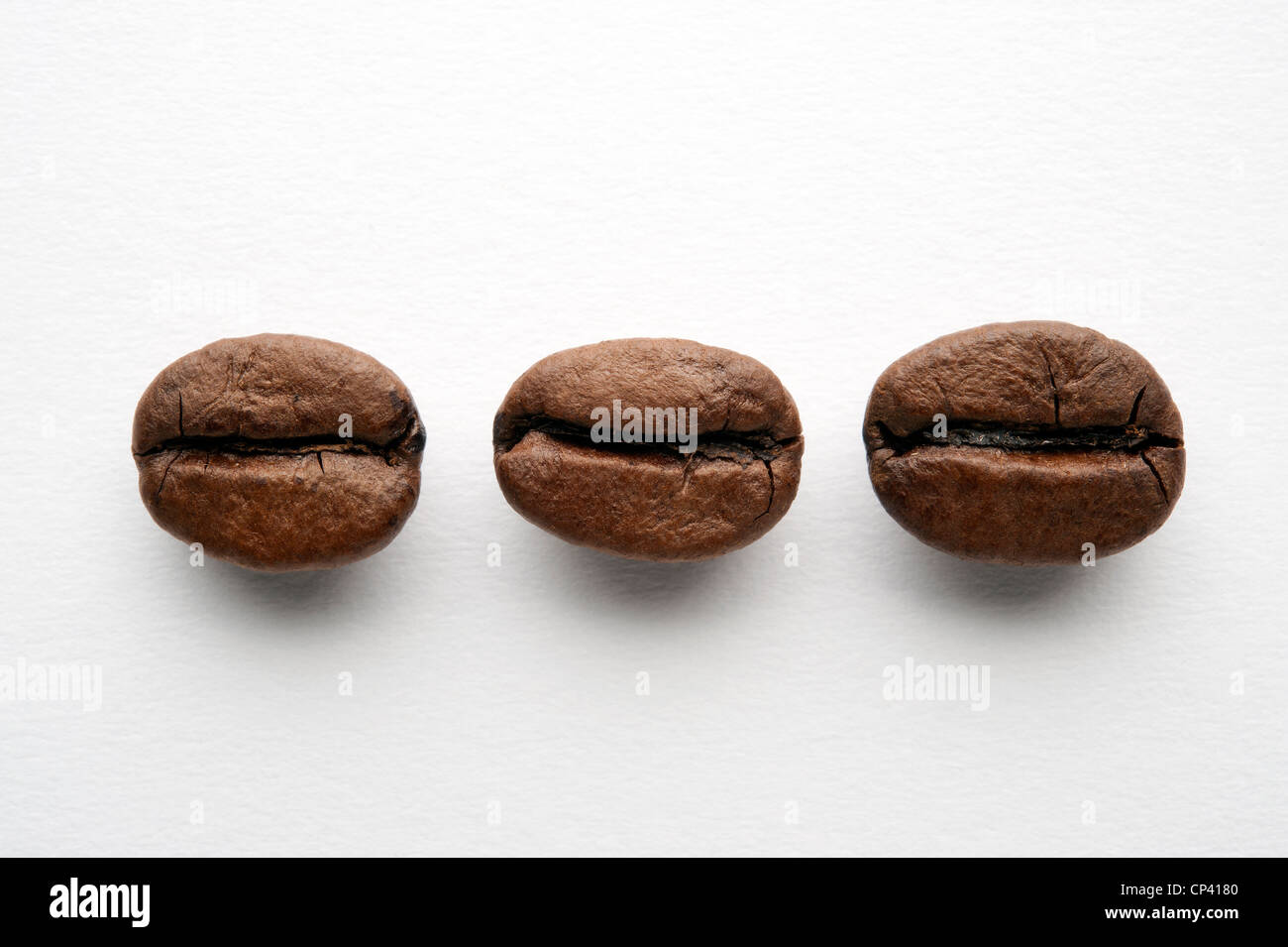 Three coffee beans hi-res stock photography and images - Alamy