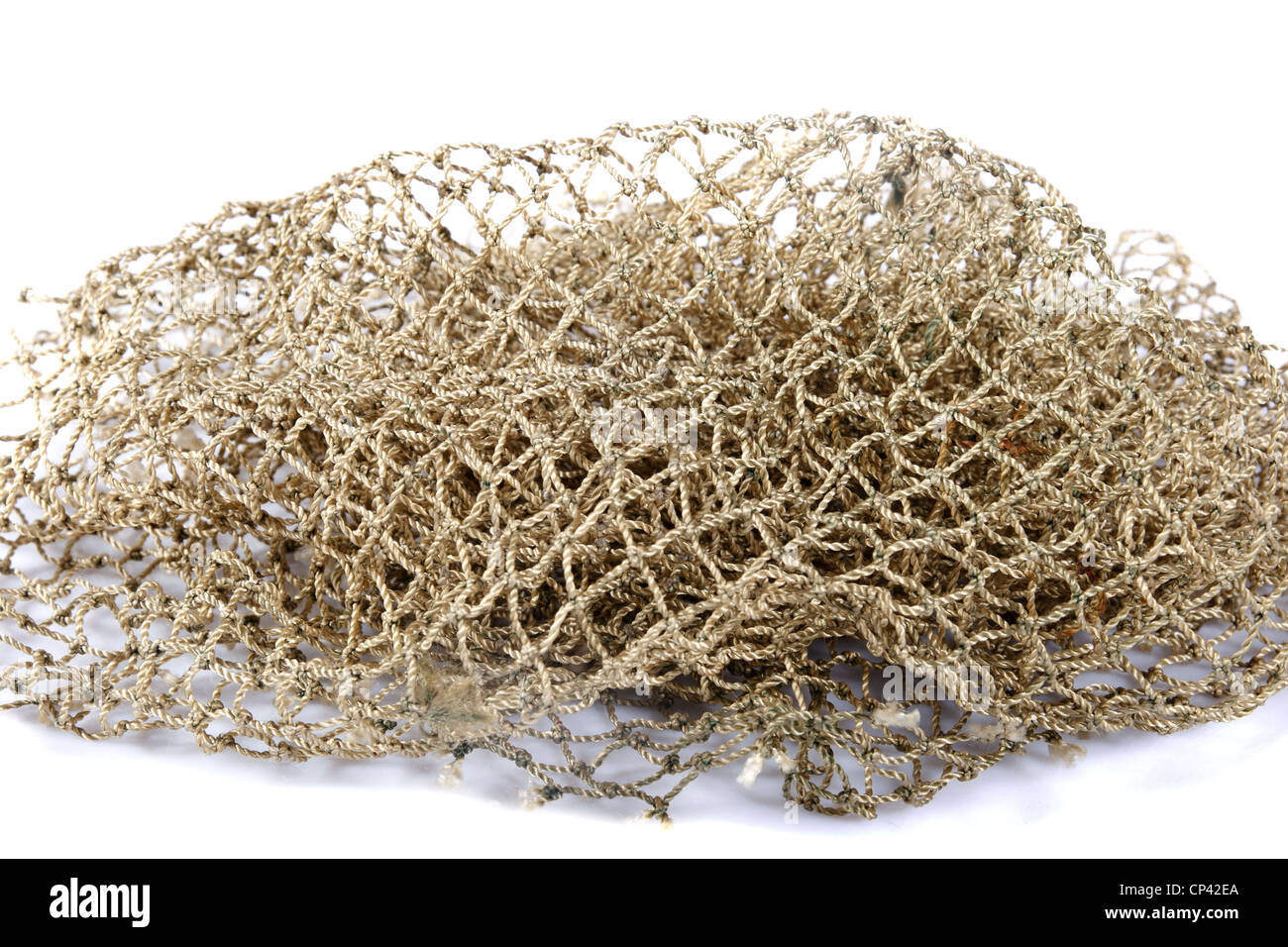 piece of fishing net on a white background Stock Photo - Alamy