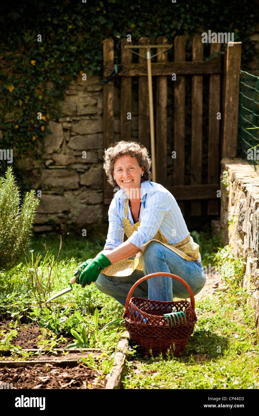 woman doing gardening Stock Photo - Alamy