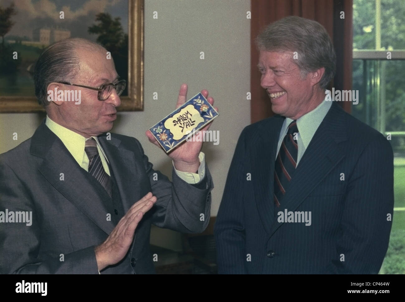 Israeli Prime Minister Menahem Begin presents Jimmy Carter with a ...