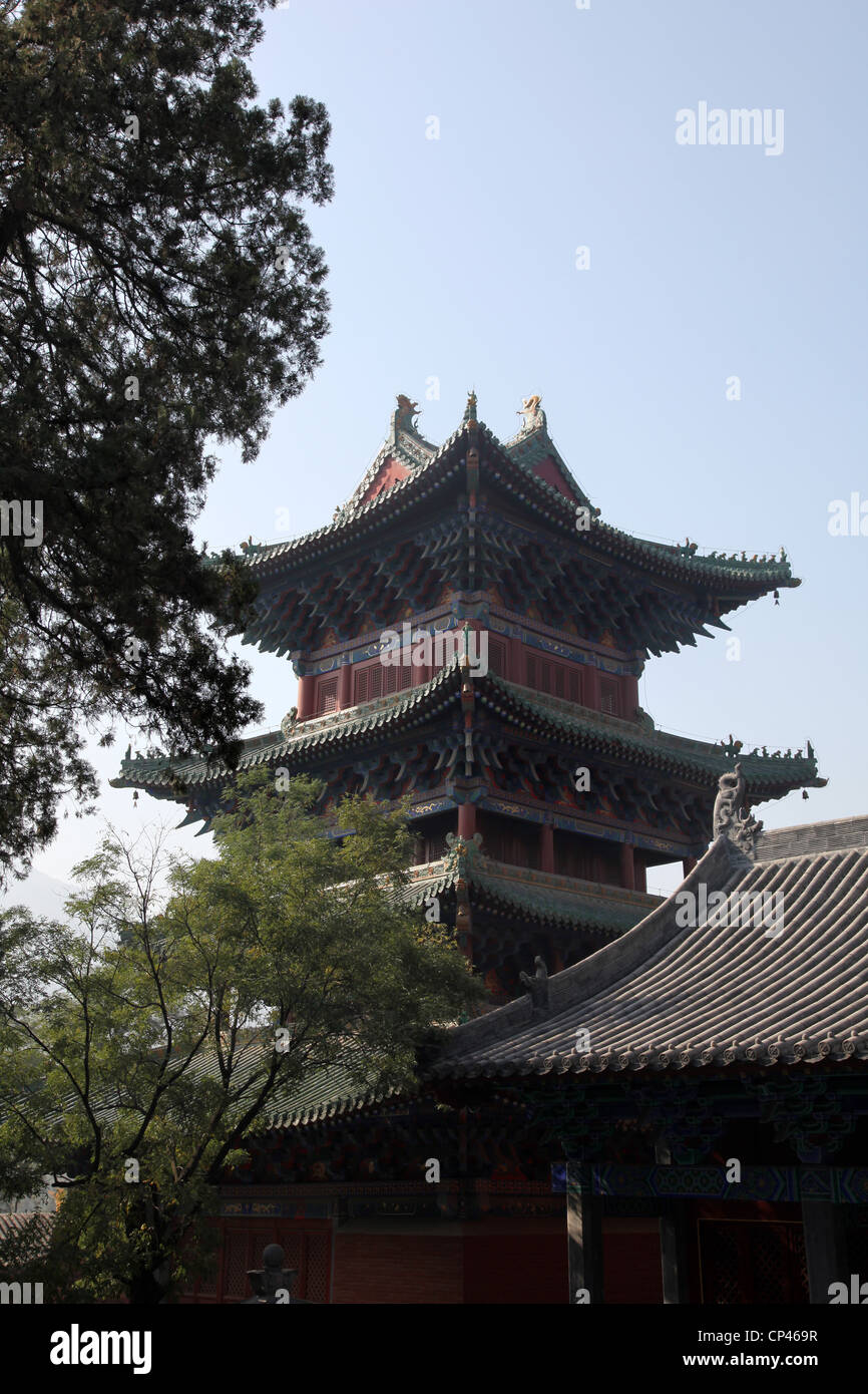 it's a temple in china where monks are praying. All the walls are red ...