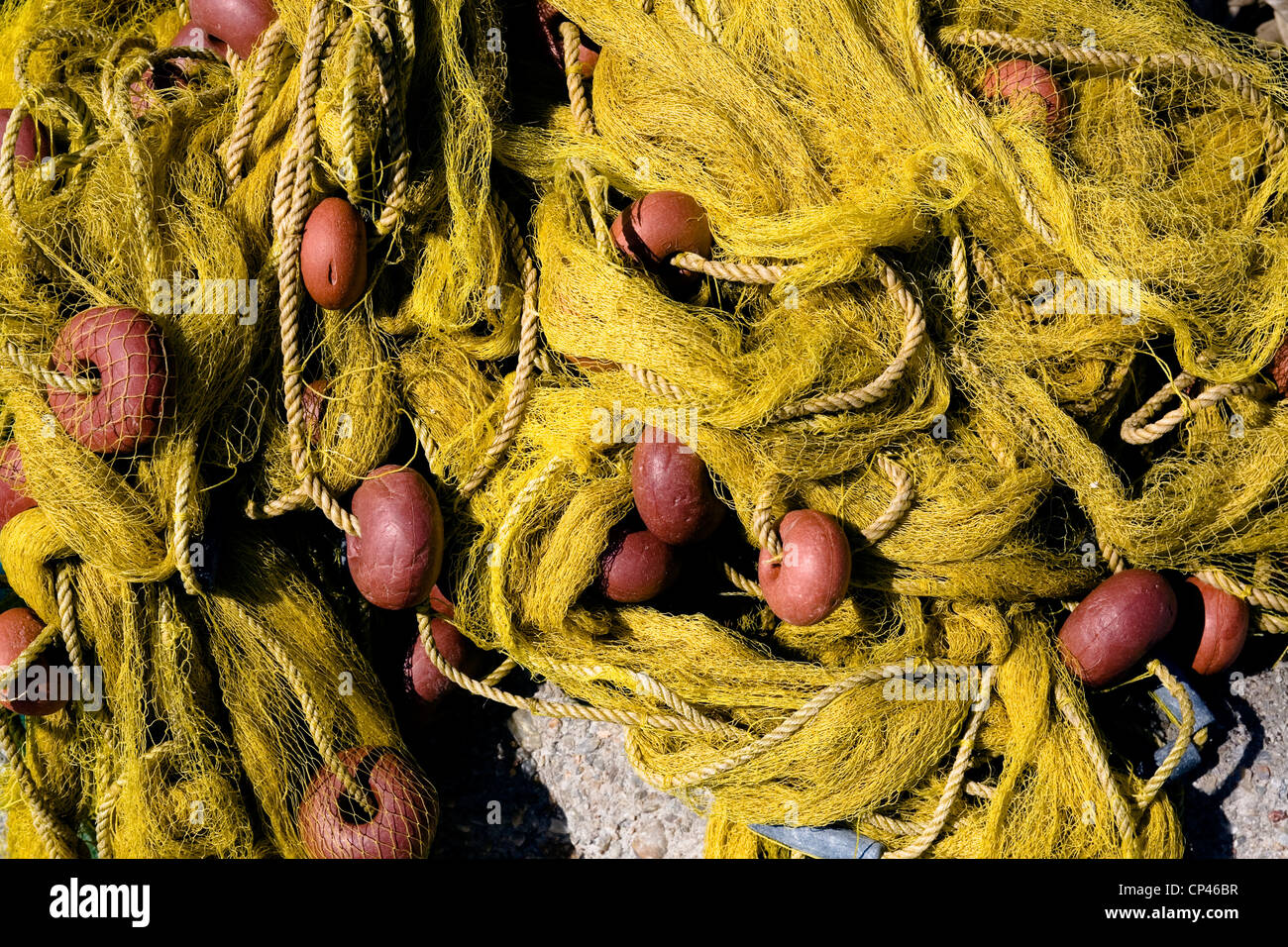 Yellow fishing nets hi-res stock photography and images - Alamy