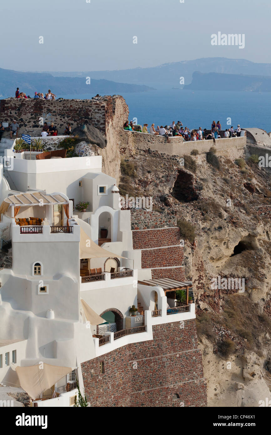 Tourists gathering for sunset over Oia Stock Photo - Alamy