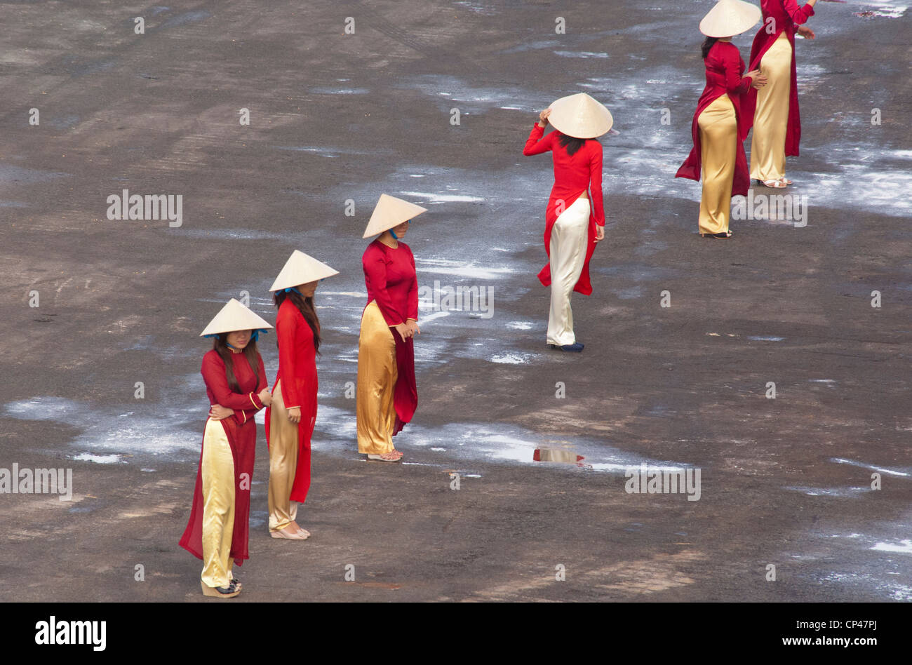 Vietnam, Ho Chi Minh City (aka Saigon). Local girls in traditional ...