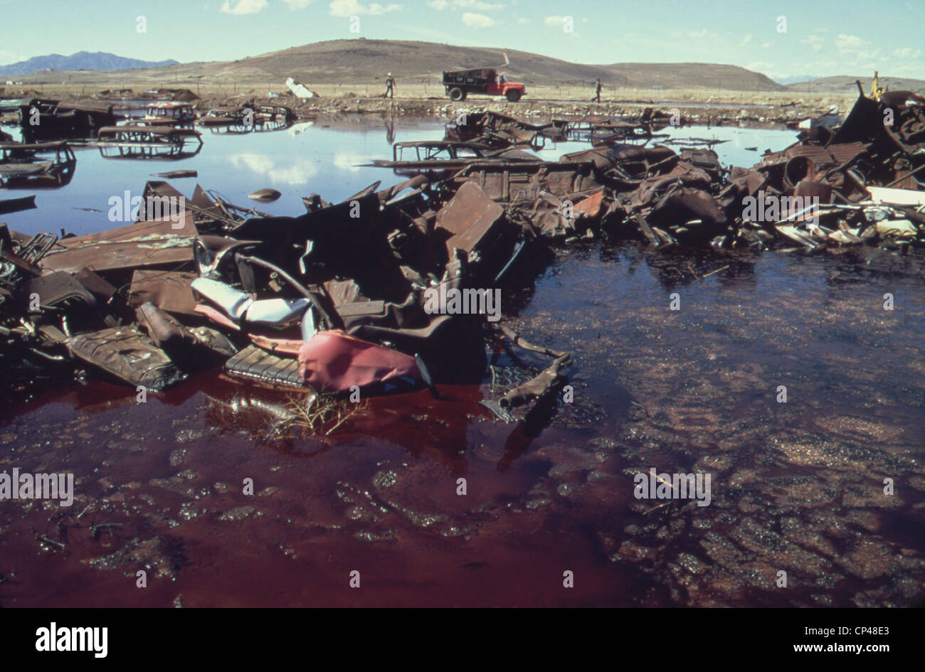 A five acre pond so polluted with junked autos acid and oil it ...