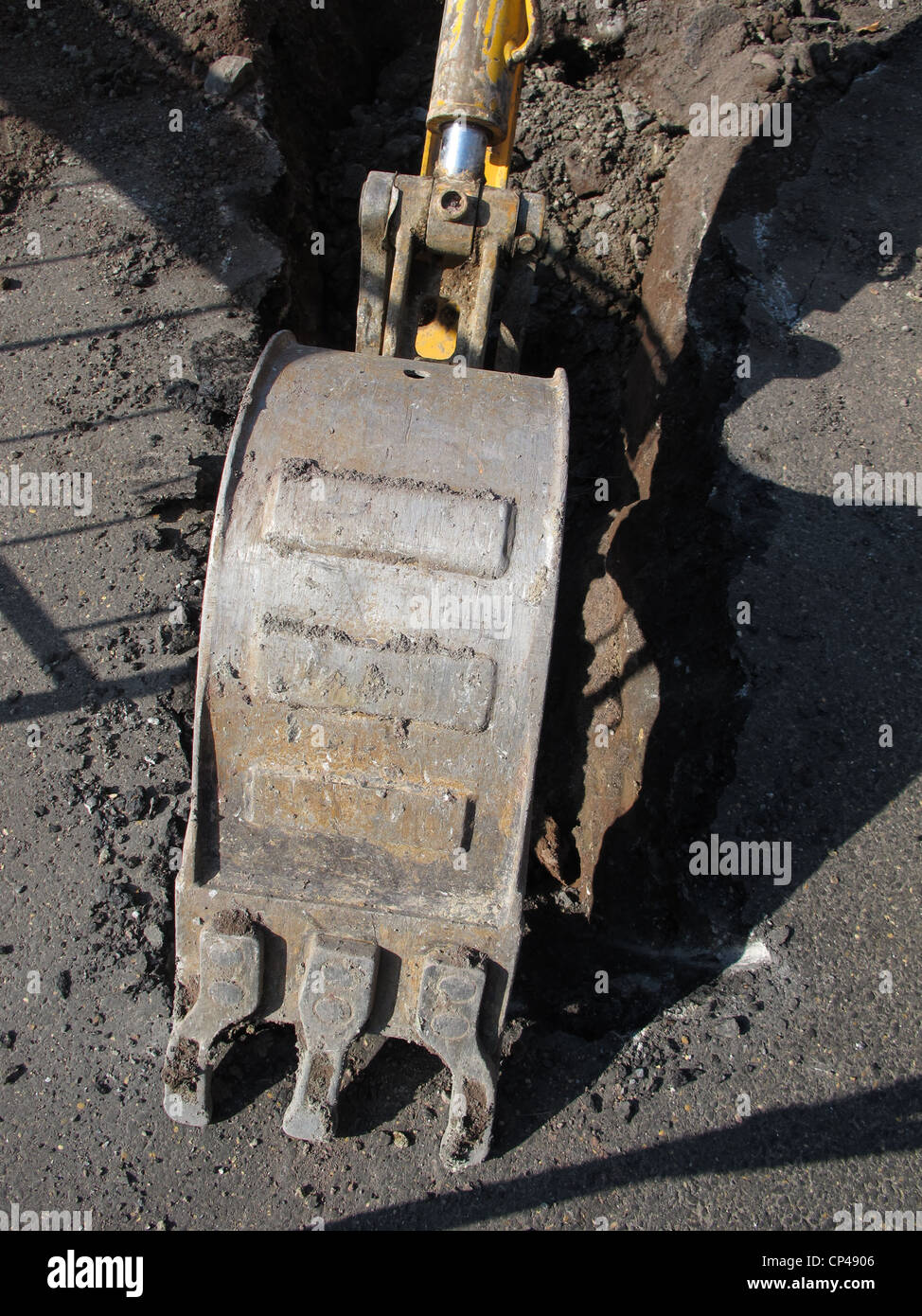excavator digger bulldozer on street road Stock Photo - Alamy