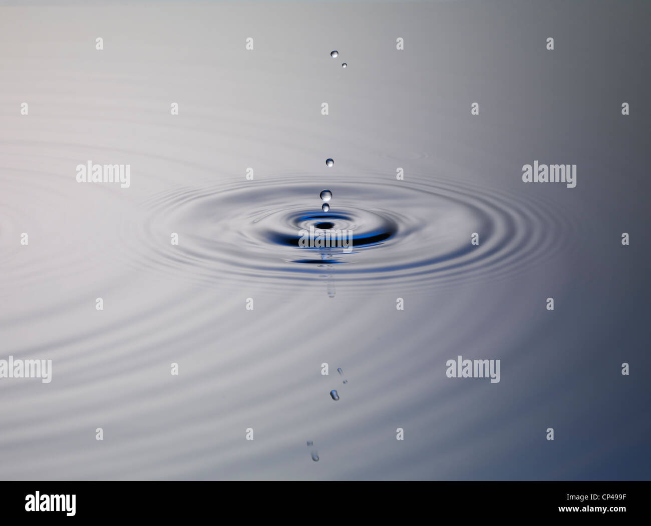 drips frozen in a pool of water Stock Photo - Alamy