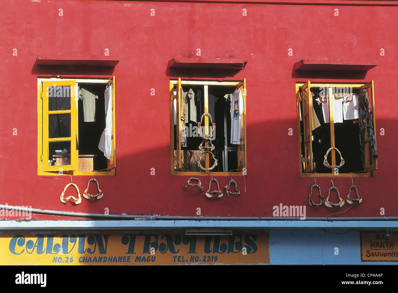 Maldives - Male Atoll - Male. Windows of a house in the harbor area ...