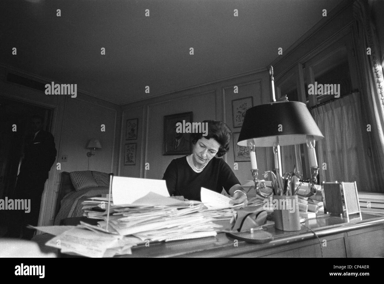 First Lady, Lady Bird Johnson, working in her study at The Elms, the ...