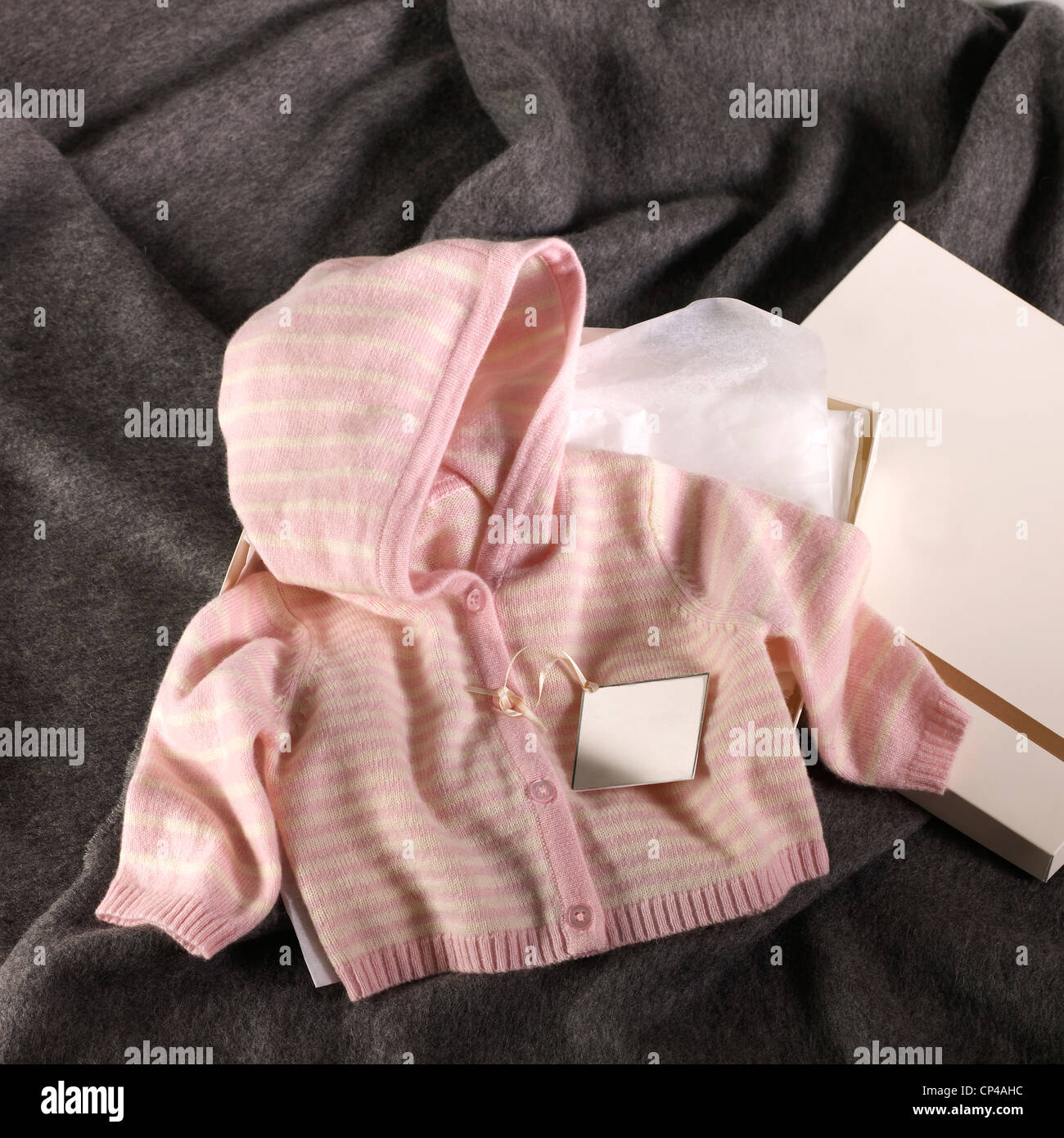 A still life shot of cute baby clothes Stock Photo - Alamy
