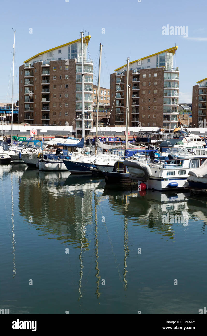 Yachts moored up at a pontoon in the Limehouse Basin, Tower Hamlets ...
