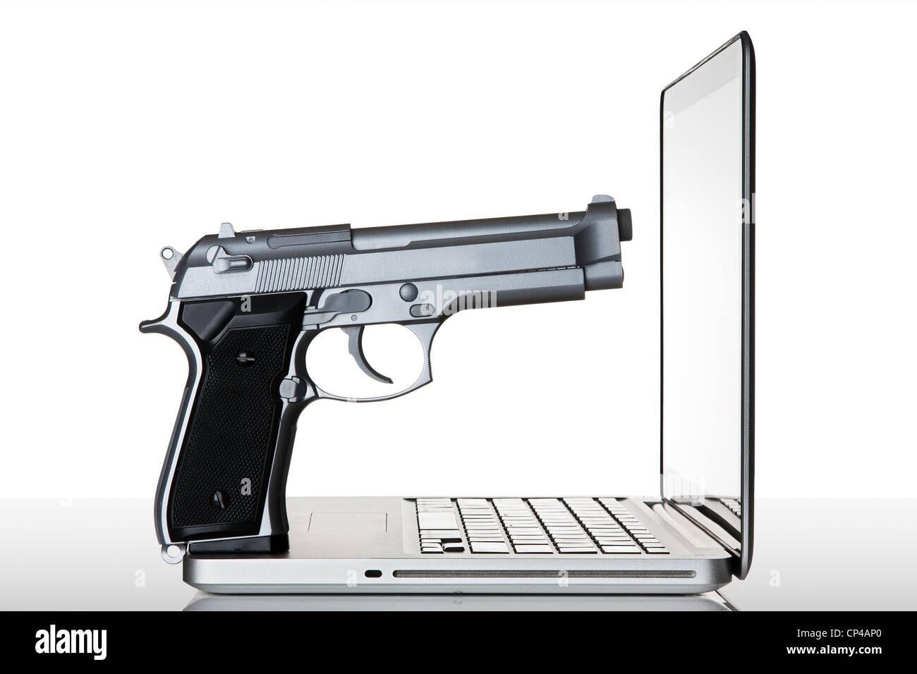 Crime internet laptop pistol hi-res stock photography and images - Alamy
