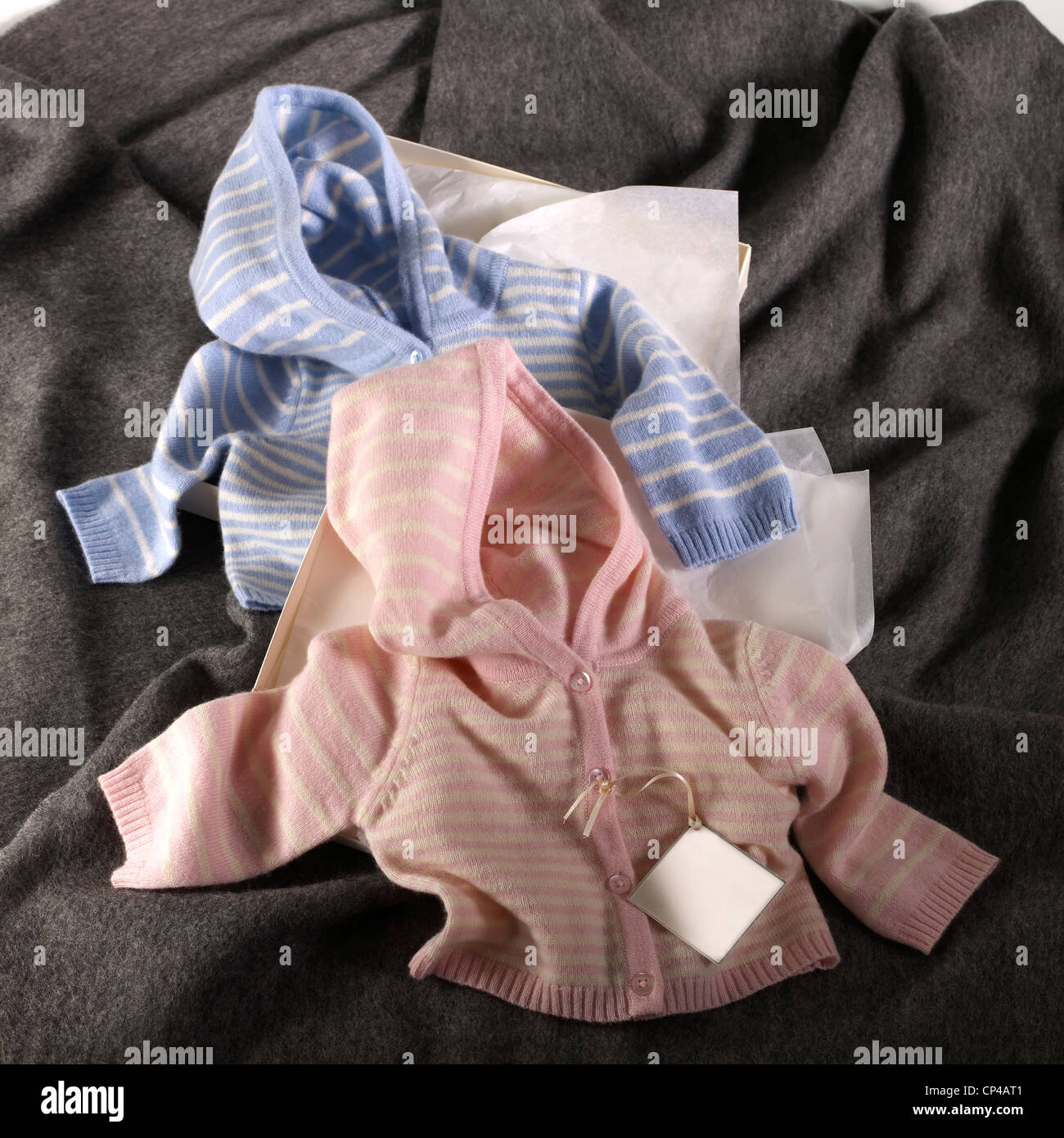A still life shot of cute baby clothes Stock Photo - Alamy