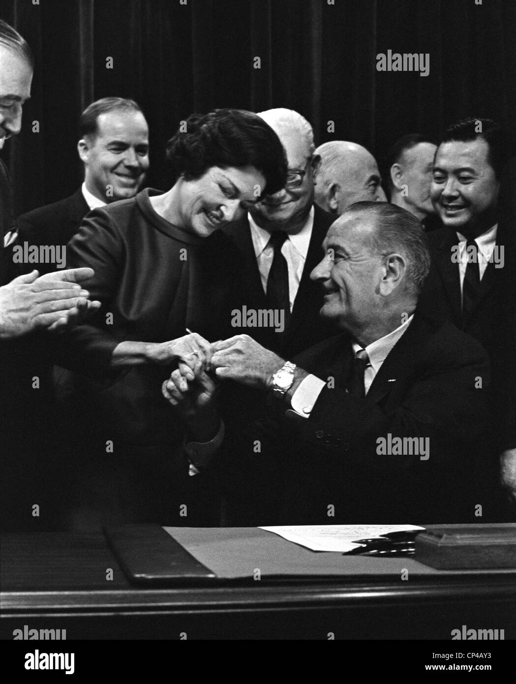 LBJ's Great Society programs. President Lyndon Johnson hands Lady Stock ...