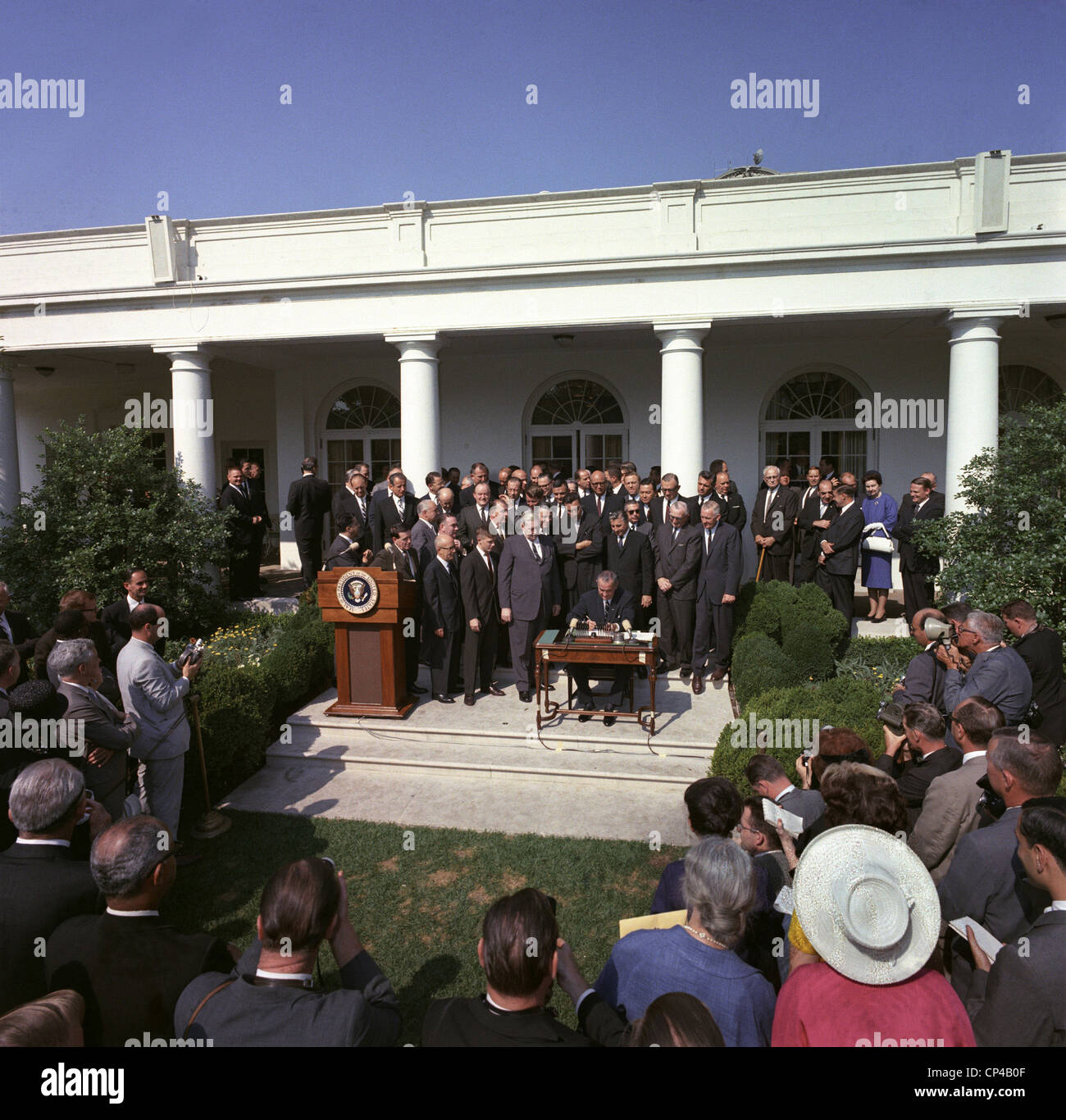 LBJ's War on Poverty. President Lyndon Johnson signing the Poverty Bill ...