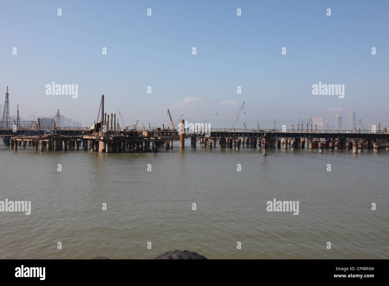 It's a photo of the harbor or port of Macau where the ferries form hong ...