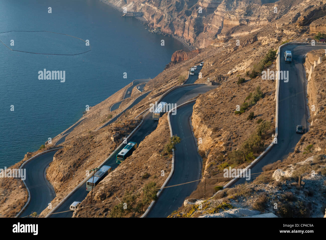 Panoramic view of road to Athinios, Santorini Stock Photo - Alamy
