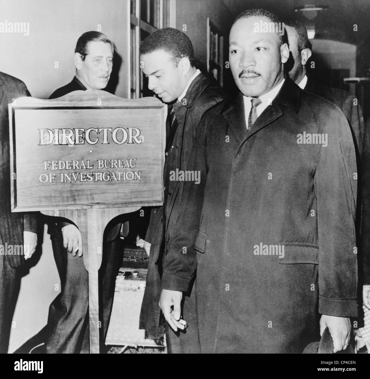 MLK enters the FBI Building. Dr. Martin Luther King, Jr. and Andrew ...