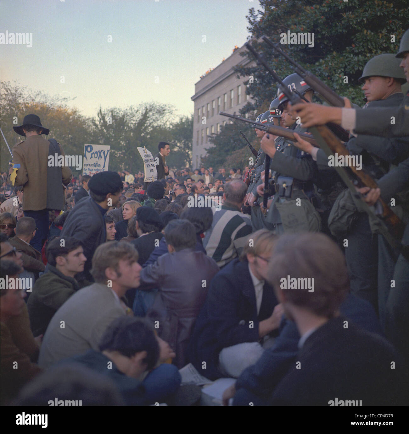 March on the Pentagon. Military police keep back protesters at the Mall ...