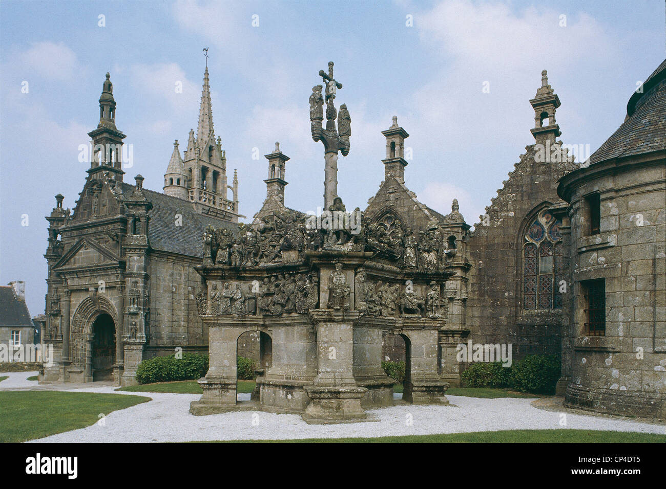 France - Brittany - Guimiliau. Enclos paroissial: Calvary with scenes of the Passion of Christ ...
