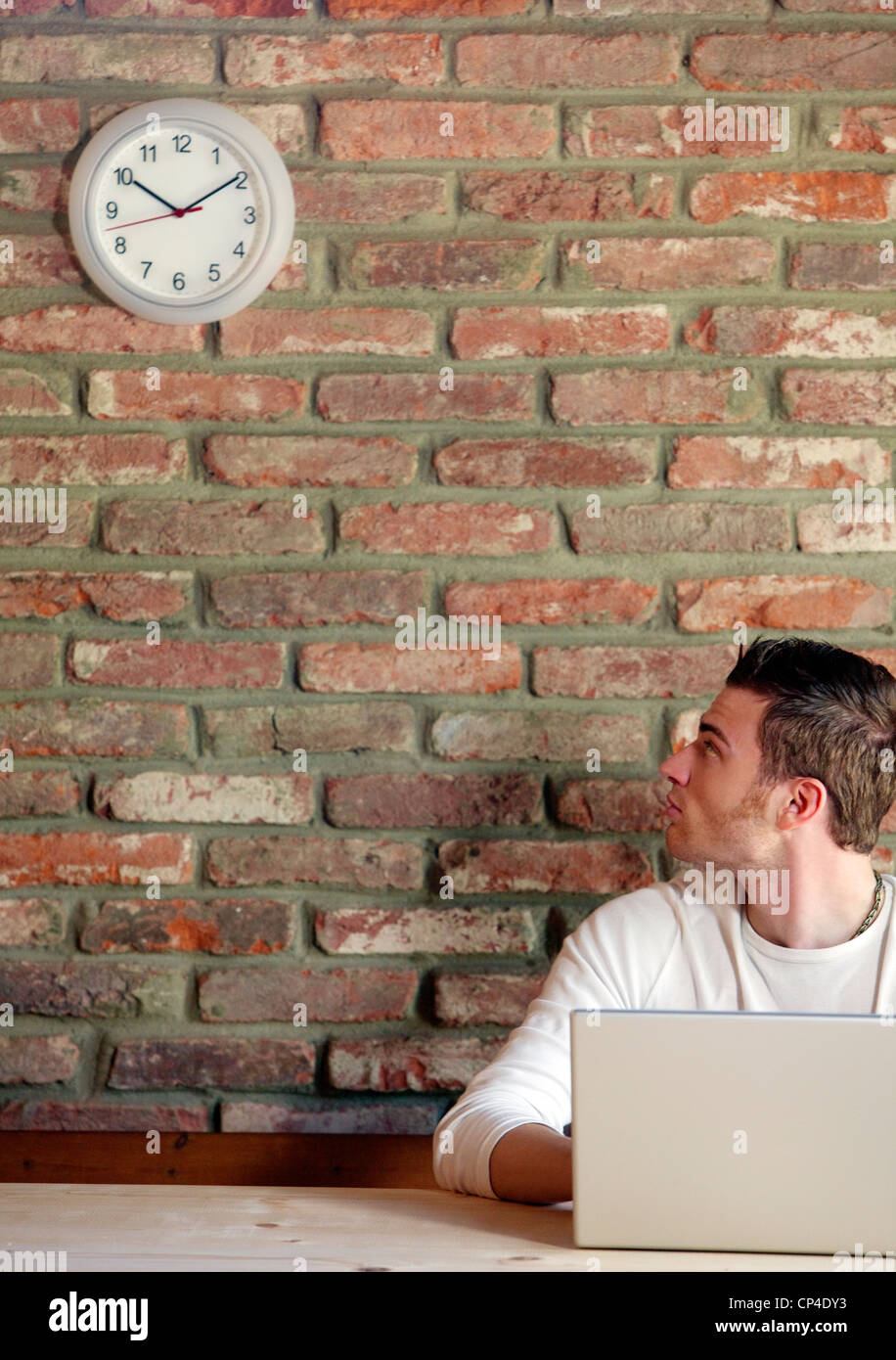 man at the computer clock Stock Photo - Alamy