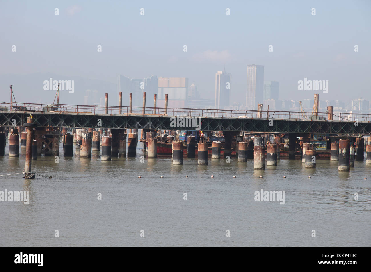 It's a photo of the harbor or port of Macau where the ferries form hong ...