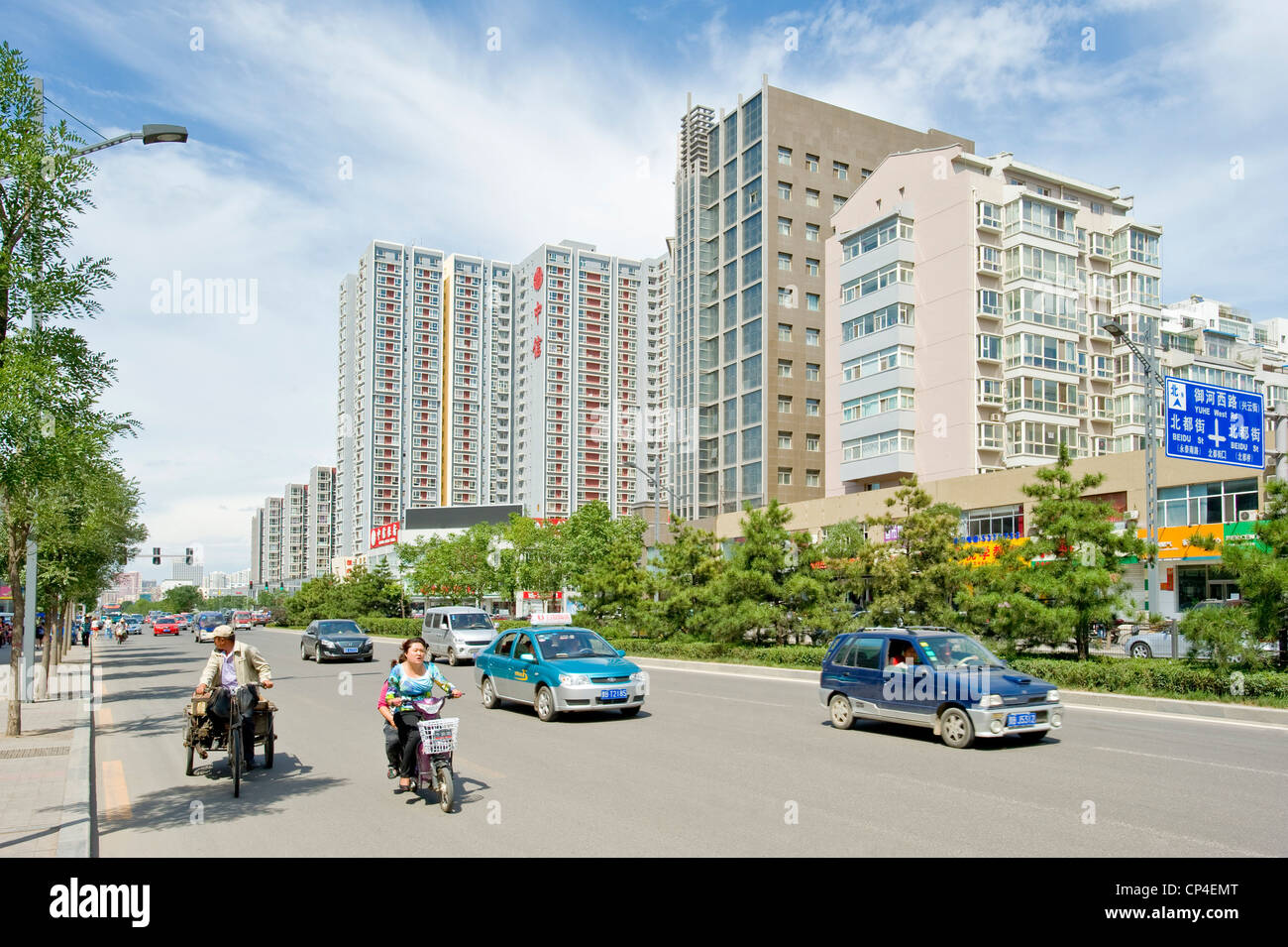 One of the main roads in Datong with modern apartment blocks in the ...
