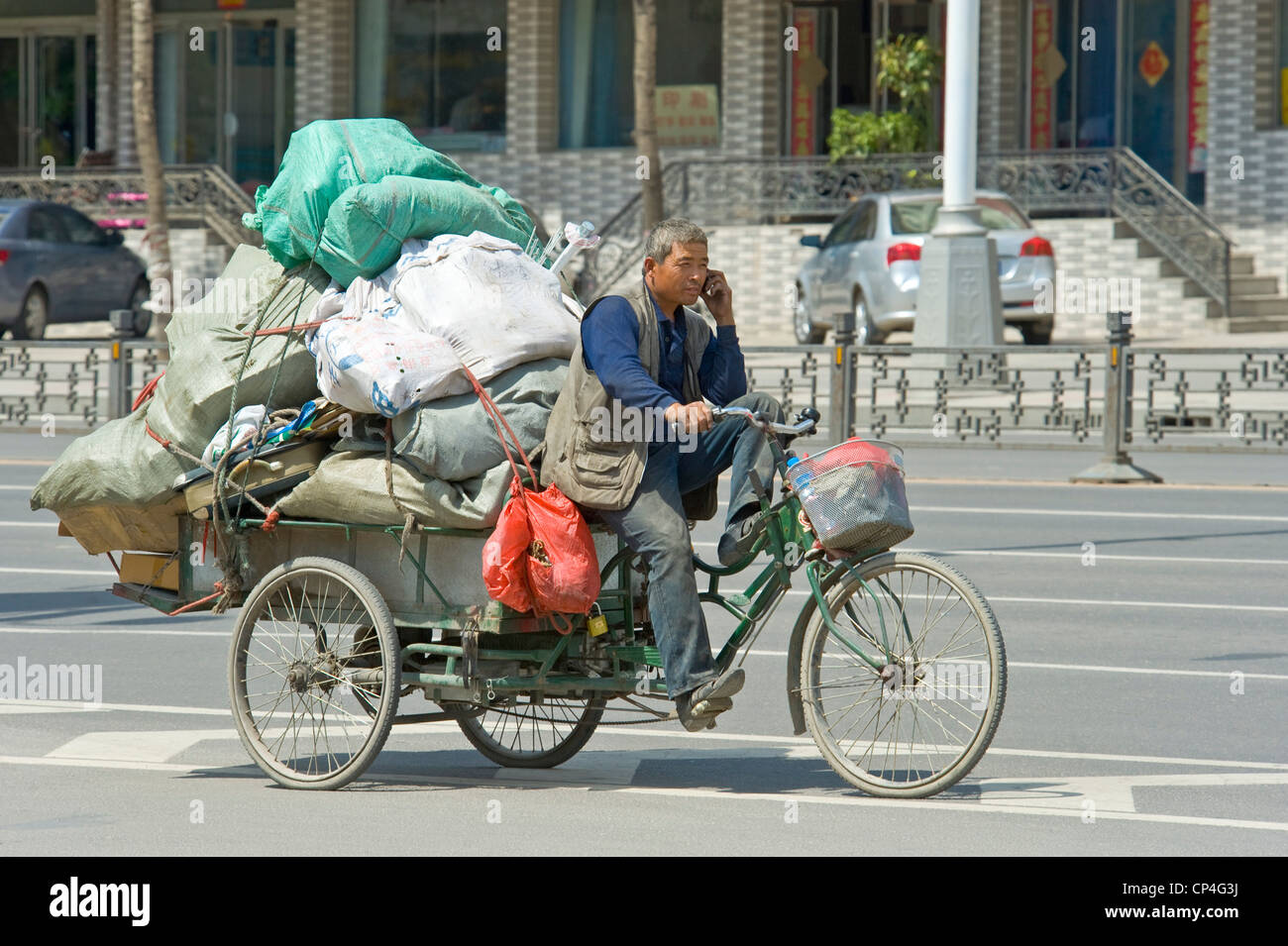 A vehicle carrying goods travelling along one of the main roads in ...