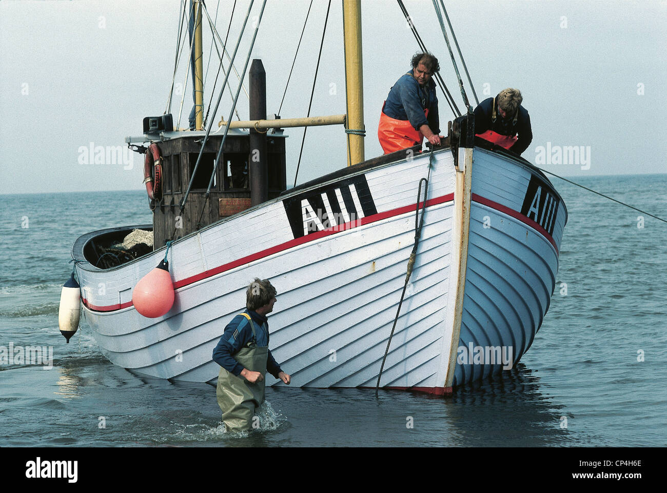 Denmark - Fishermen on a fishing boat Stock Photo - Alamy